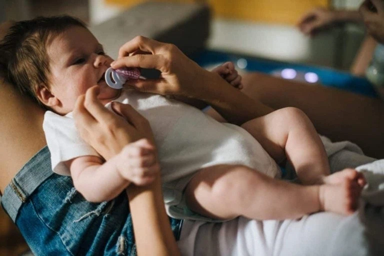 When Do Babies Start Grabbing Things? - Baby Chick